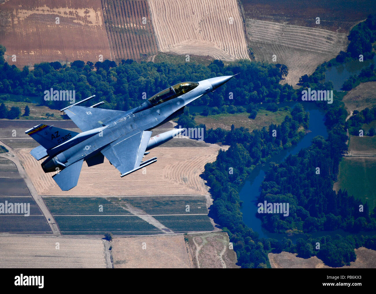 F-16D Fighting Falcons from the 162nd Fighter Wing, Ariz., intercepts a ...