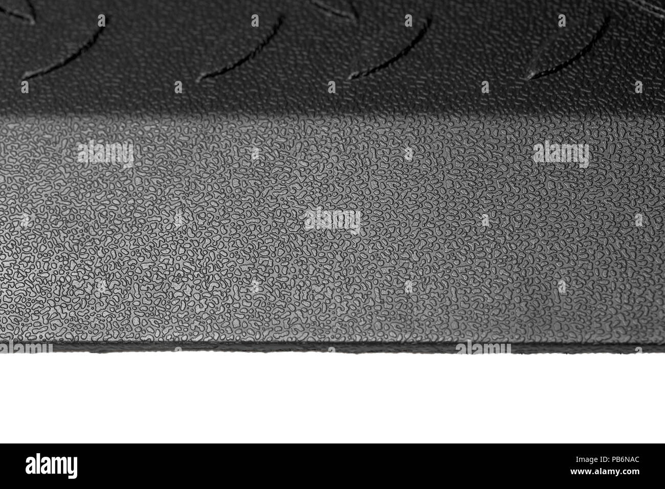 Black Rubber mat half lighted Stock Photo - Alamy