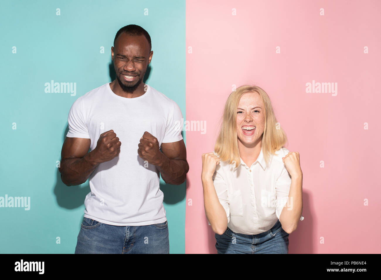 We won. Winning success happy afro man and woman celebrating being a ...