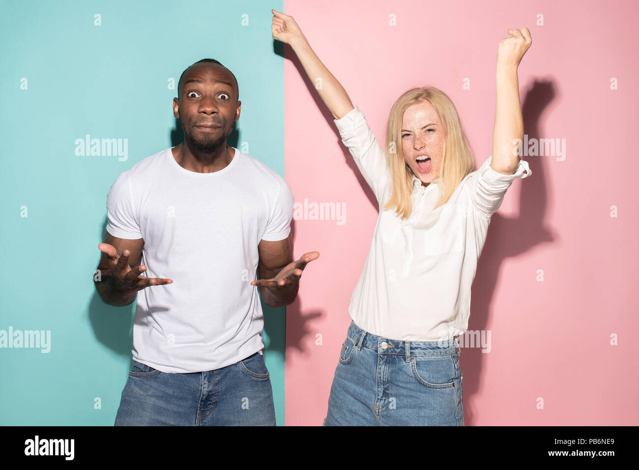 We won. Winning success happy afro man and woman celebrating being a ...