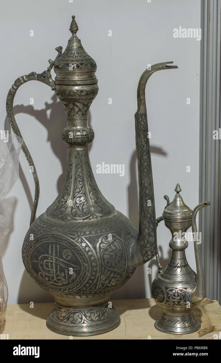Very old style metal ewer water jar in view Stock Photo - Alamy