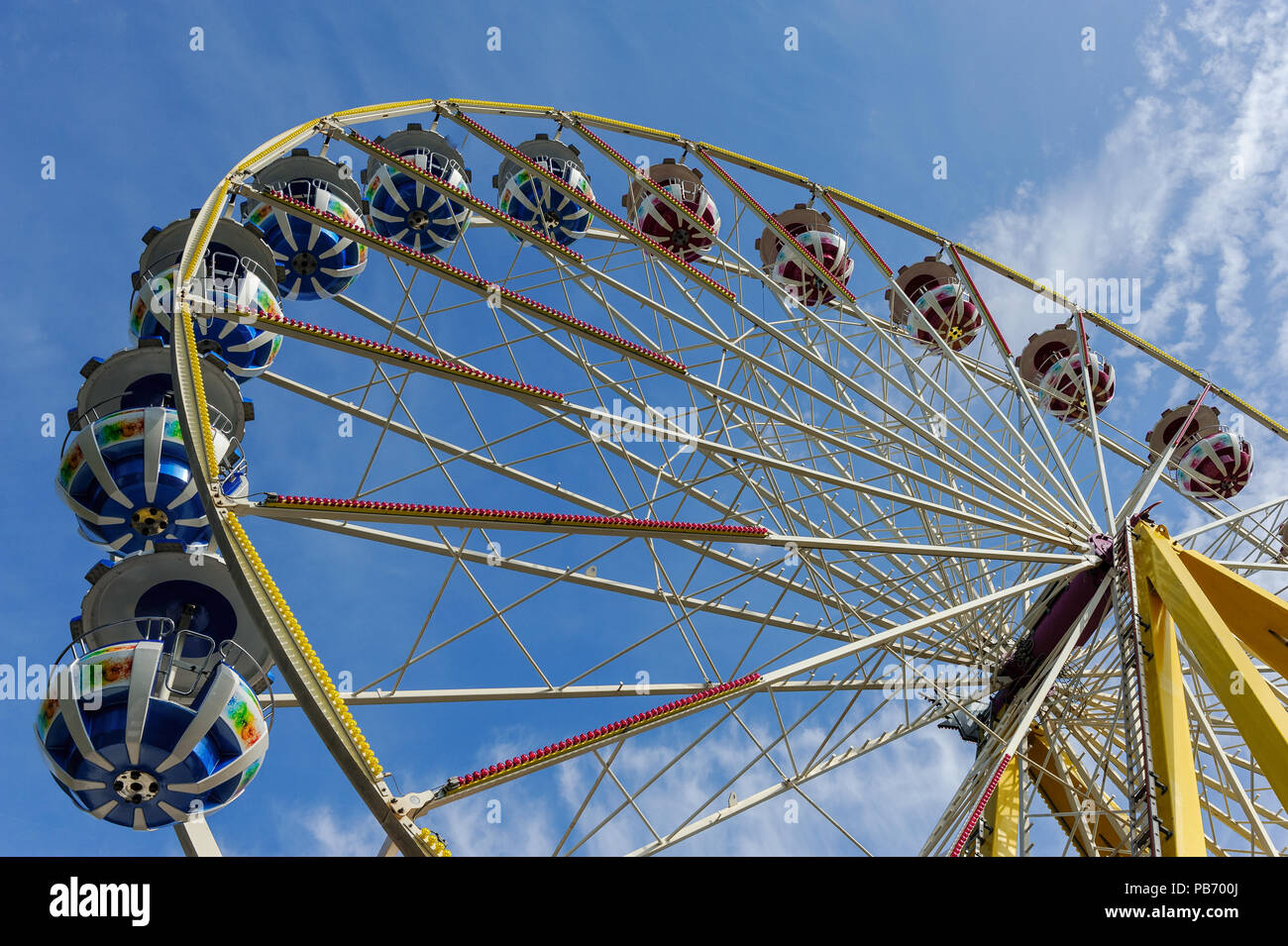 Ferris wheel at the funfair seen from below Stock Photo - Alamy