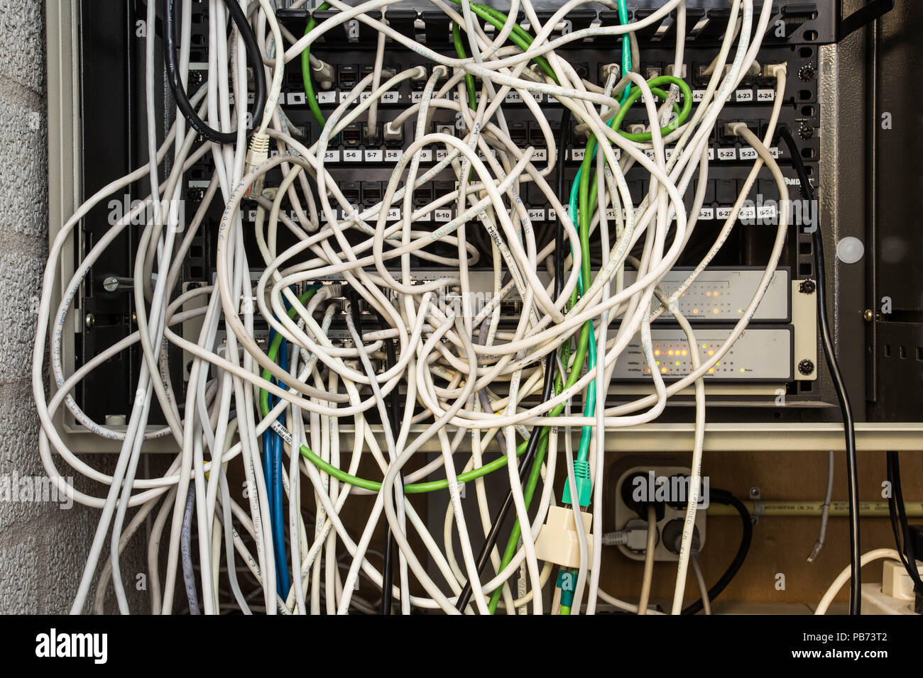 Chaos of network cables tangled computer Stock Photo - Alamy