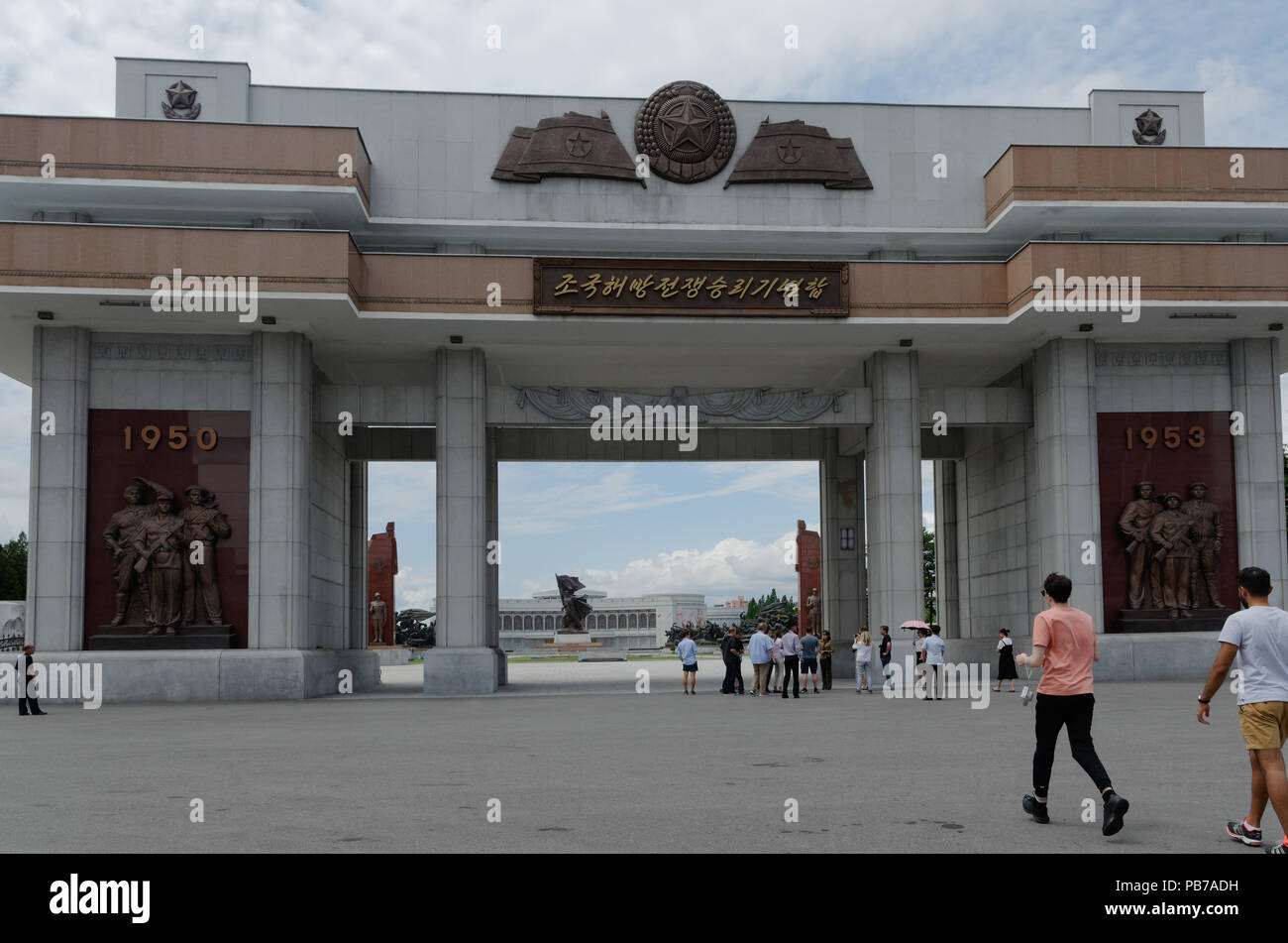 Tourists entering the Victorious War Museum in Pyongyang, North Korea ...