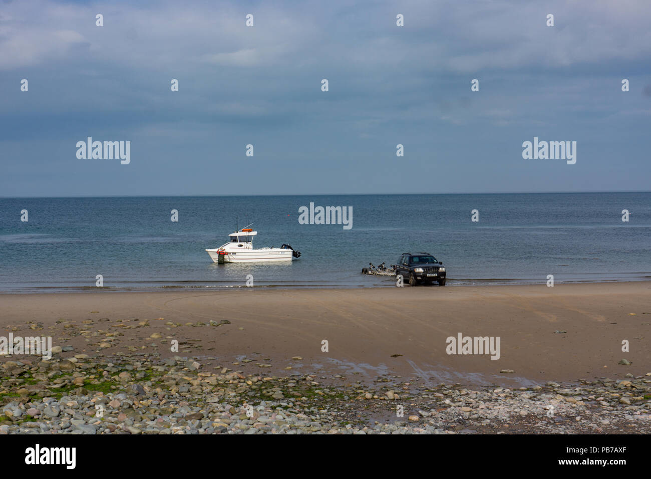 Collecting boat from sea. Mull of Galloway. Scotland Stock Photo - Alamy