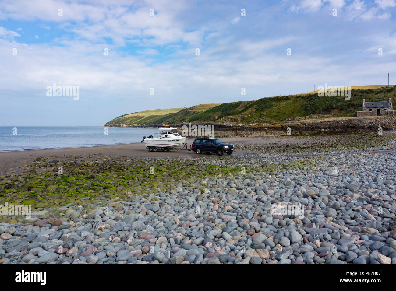 Collecting boat from sea. Mull of Galloway. Scotland Stock Photo - Alamy