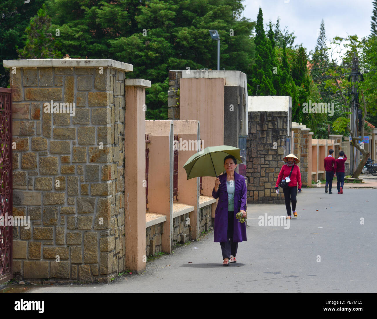 Dalat, Vietnam - Nov 27, 2017. People walking on street in Dalat ...