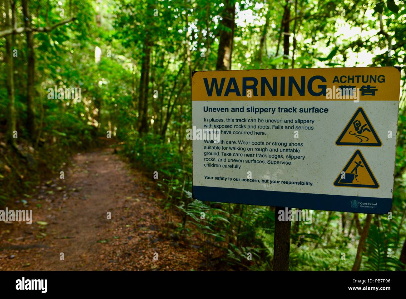 Warning uneven and slippery track sign hi-res stock photography and ...
