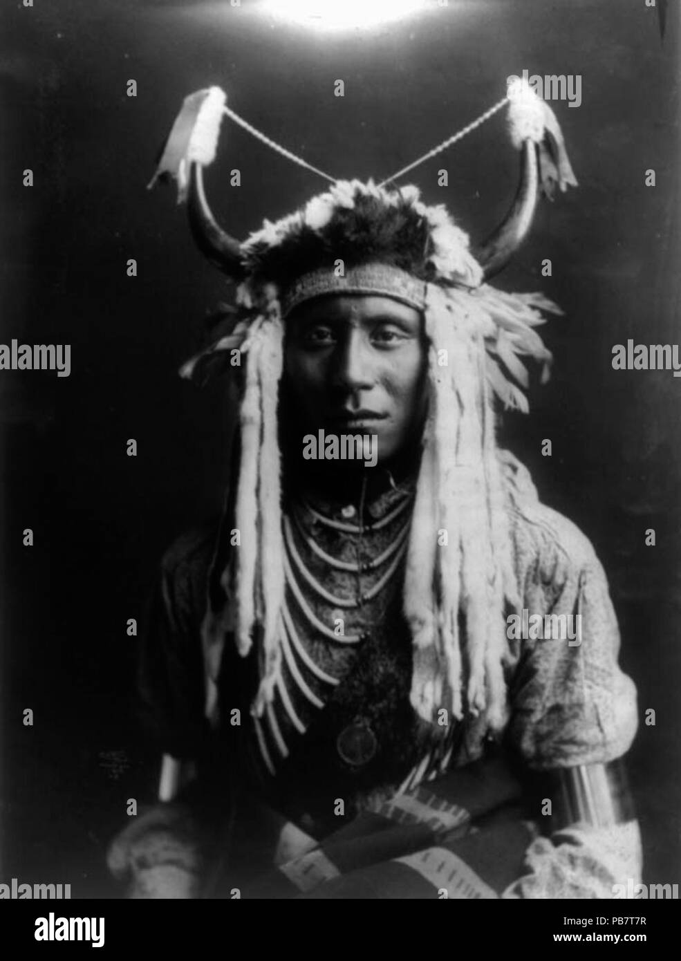 748 Head Carry-Piegan Blackfoot Indian- Edward S. Curtis Stock Photo ...