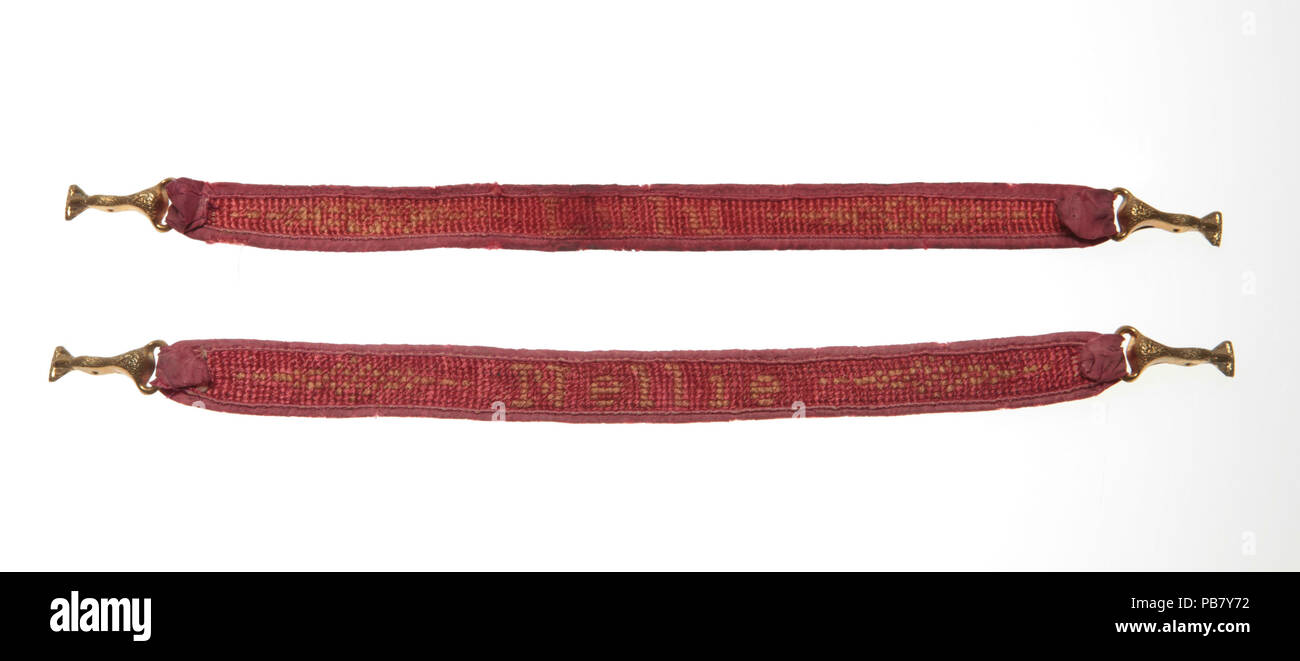 1249 Red Fabric Garters with Gold Clips Stock Photo - Alamy