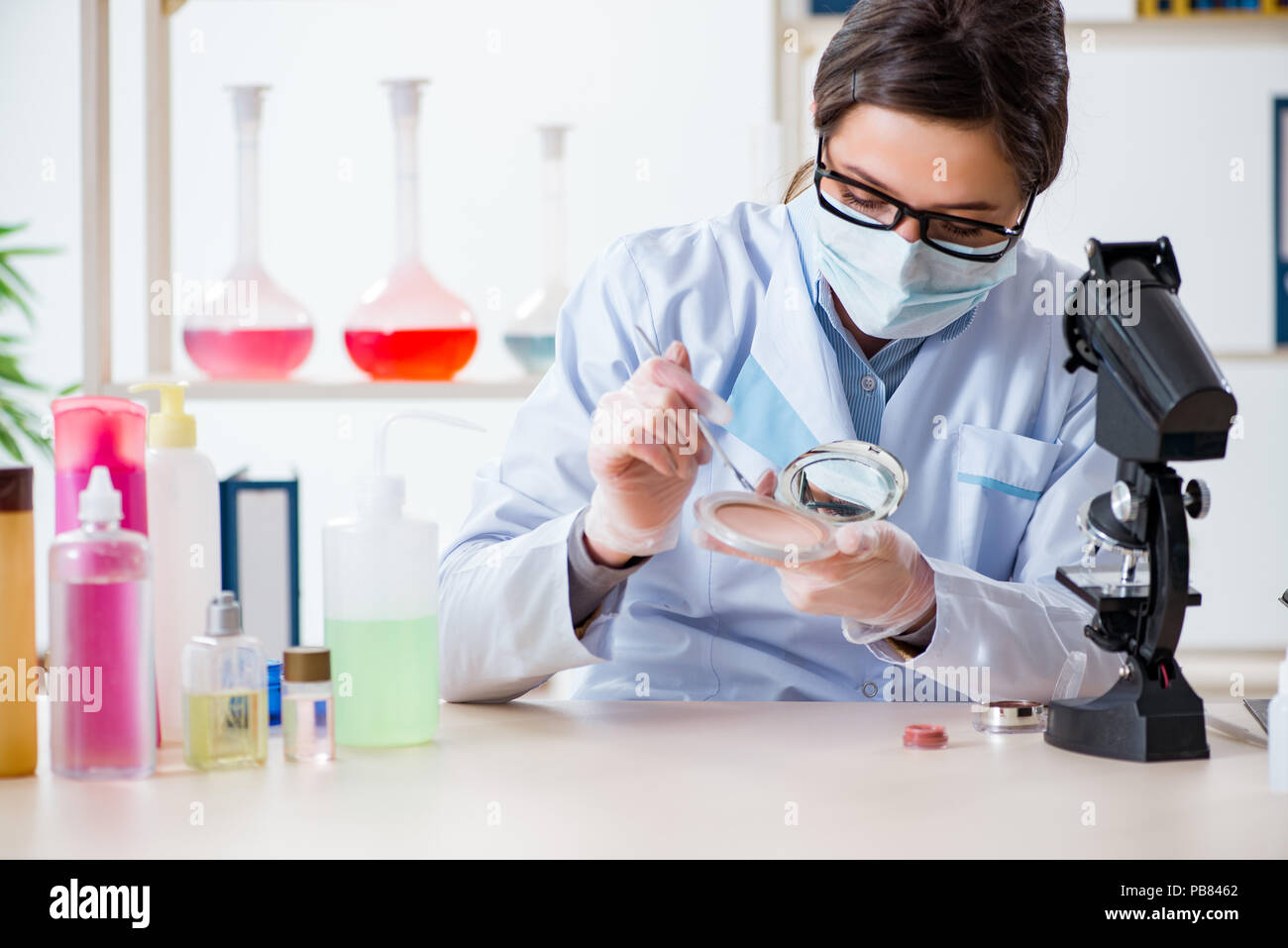 Lab chemist checking beauty and make-up products Stock Photo - Alamy