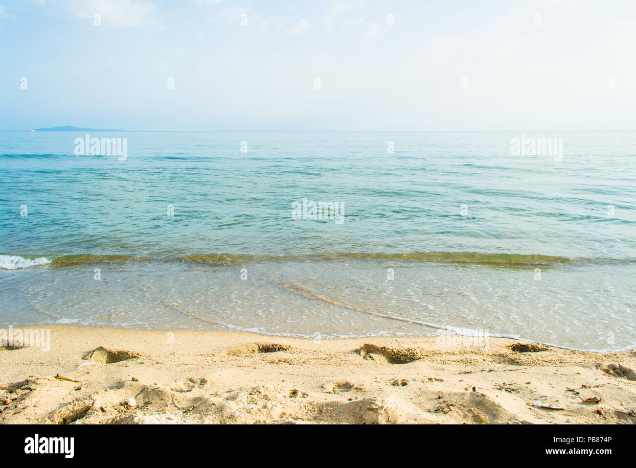 crystal clear water on the beach in summer morning Stock Photo - Alamy