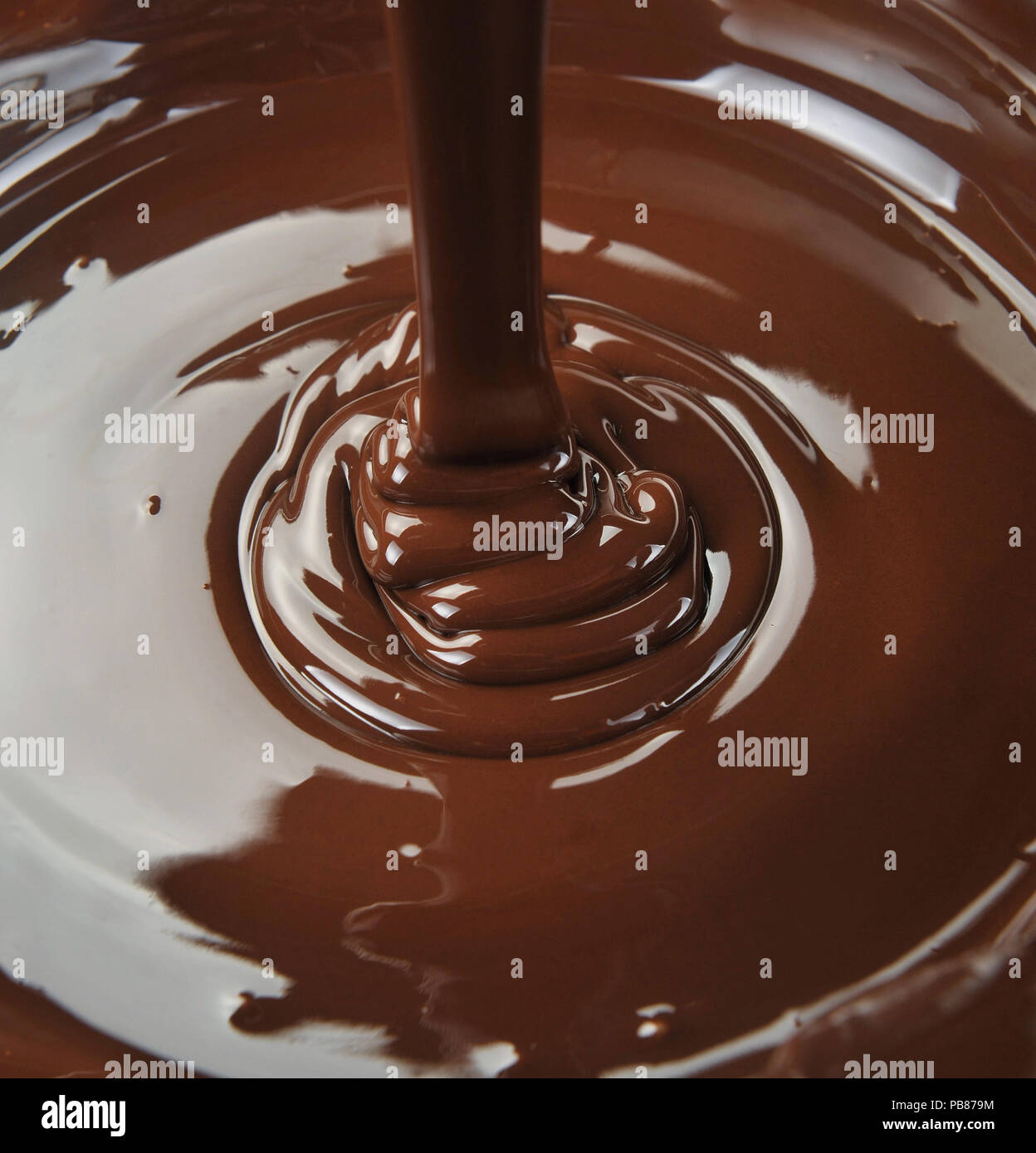 lots of chocolate falling from above Stock Photo - Alamy