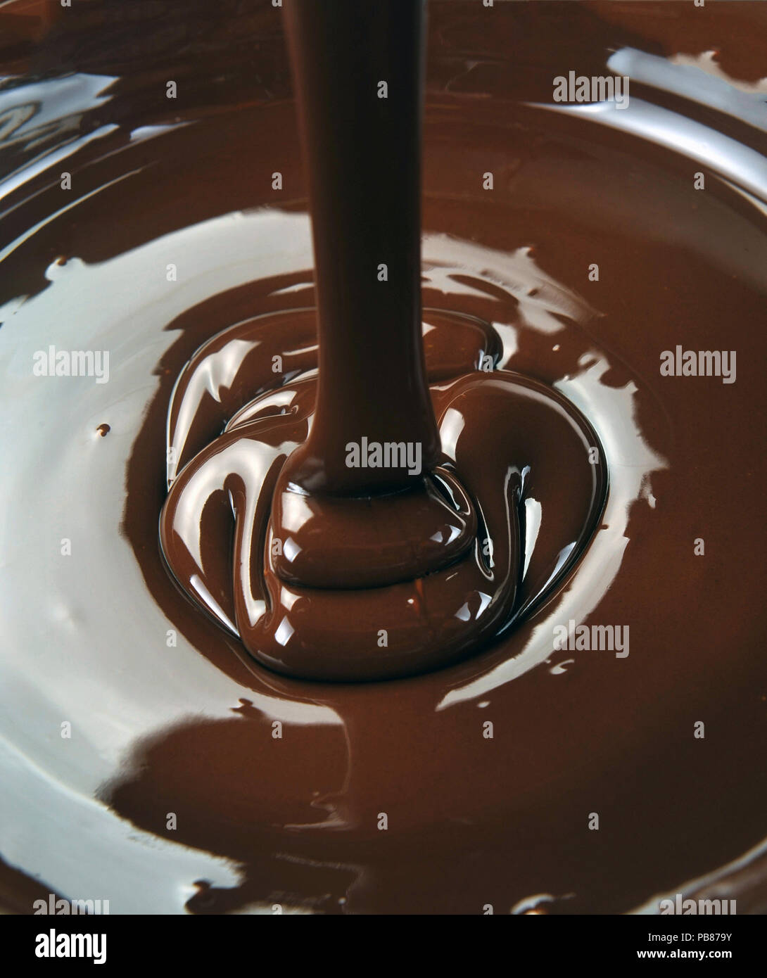 lots of chocolate falling from above Stock Photo - Alamy