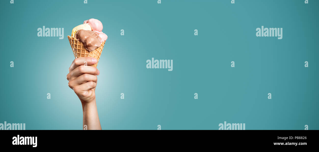 Hand holding ice cream hi-res stock photography and images - Alamy