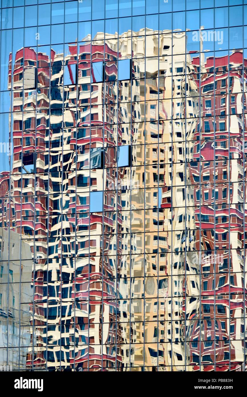 Front view of large modern office building in Singapore with glass ...