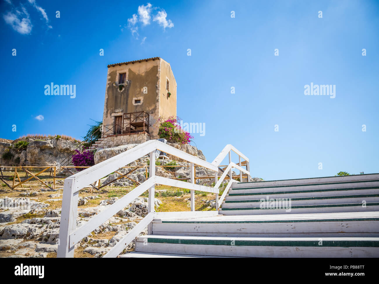 Traditional old Sicilian house during a sunny day with a wonderful blue ...