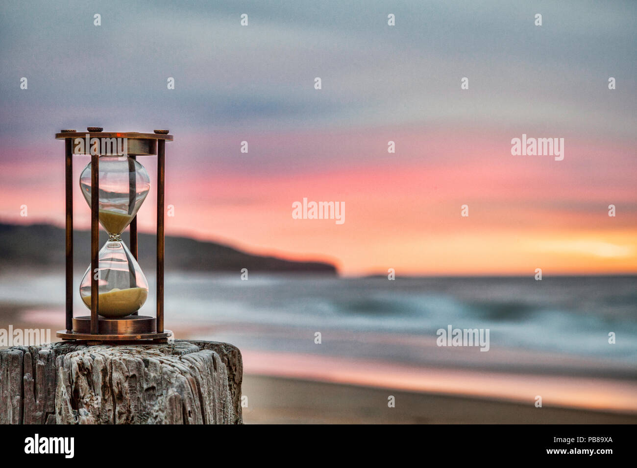 Hourglass standing hi-res stock photography and images - Alamy