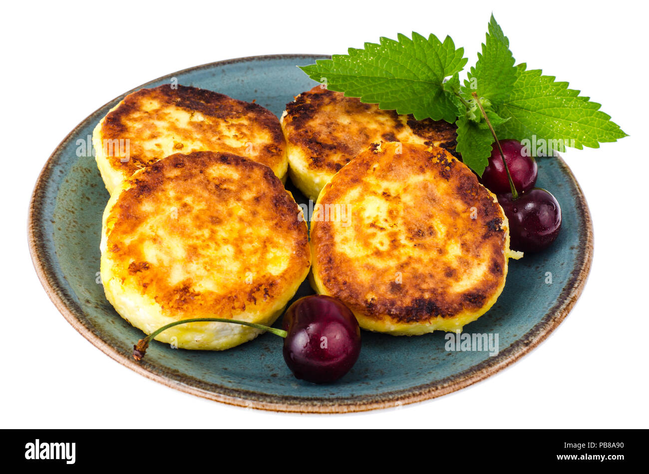 Plate with curd pancakes, isolated on white background. Studio Photo ...