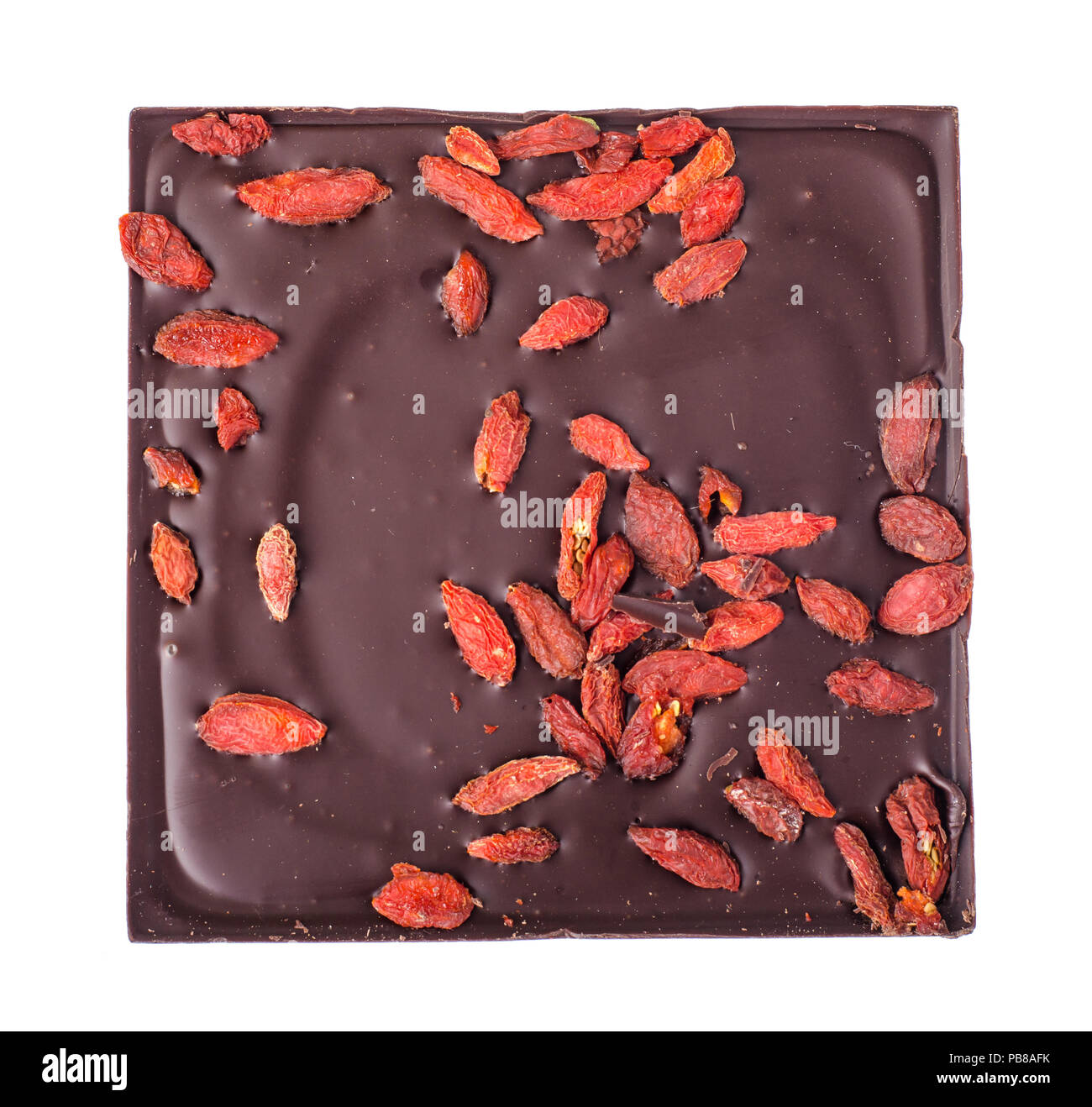 Black bitter chocolate with goji berries. Studio Photo Stock Photo - Alamy