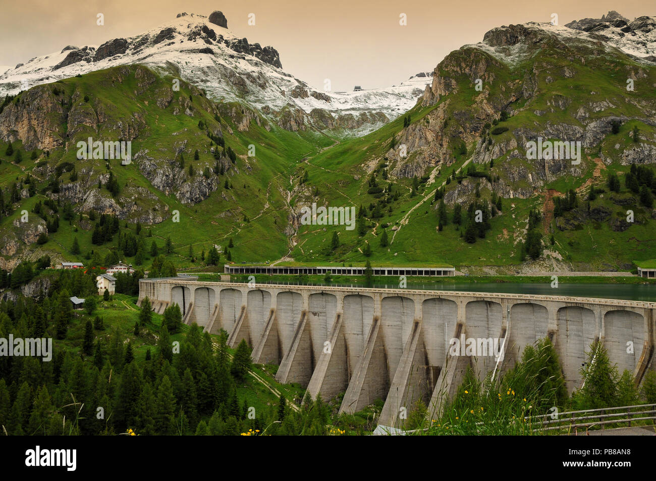 Dam and mountain lake at the fedaia pass hi-res stock photography and ...
