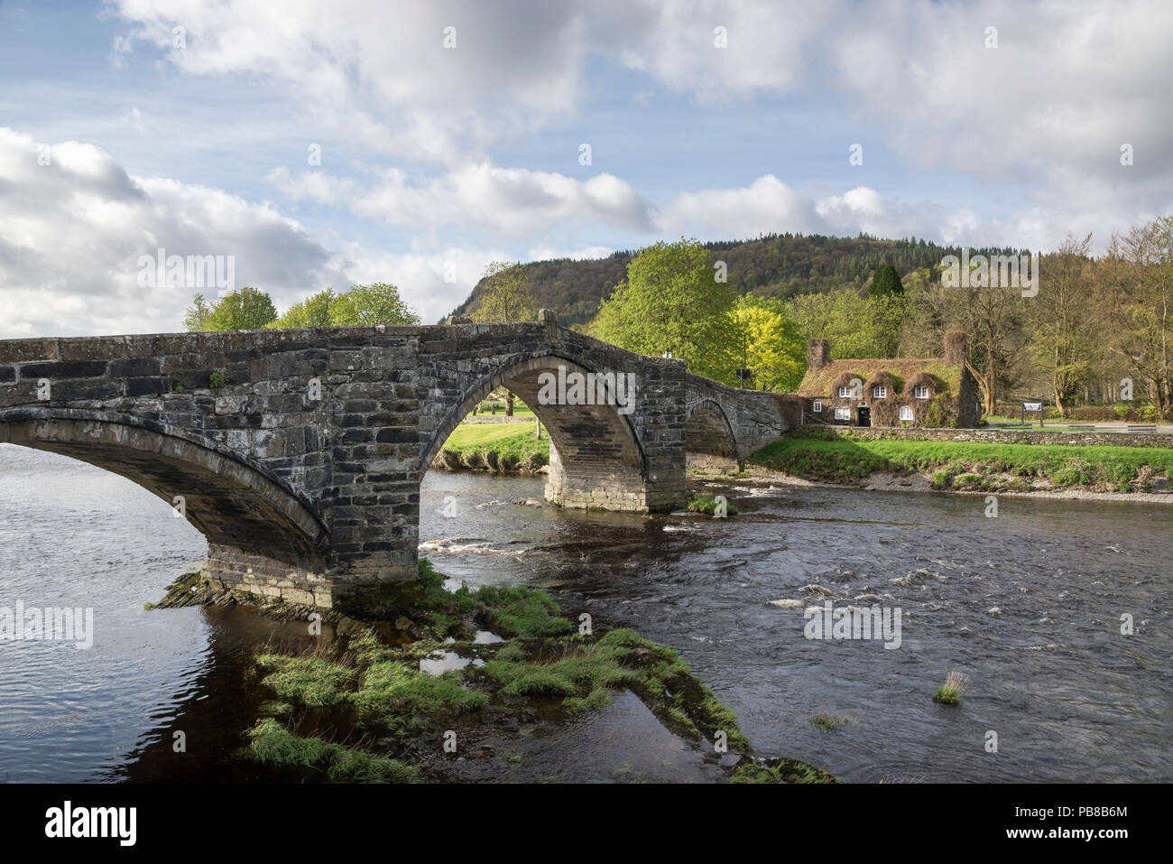 Pont Fawr bridge over the river Conwy, Llanrwst, North Wales, UK. A ...