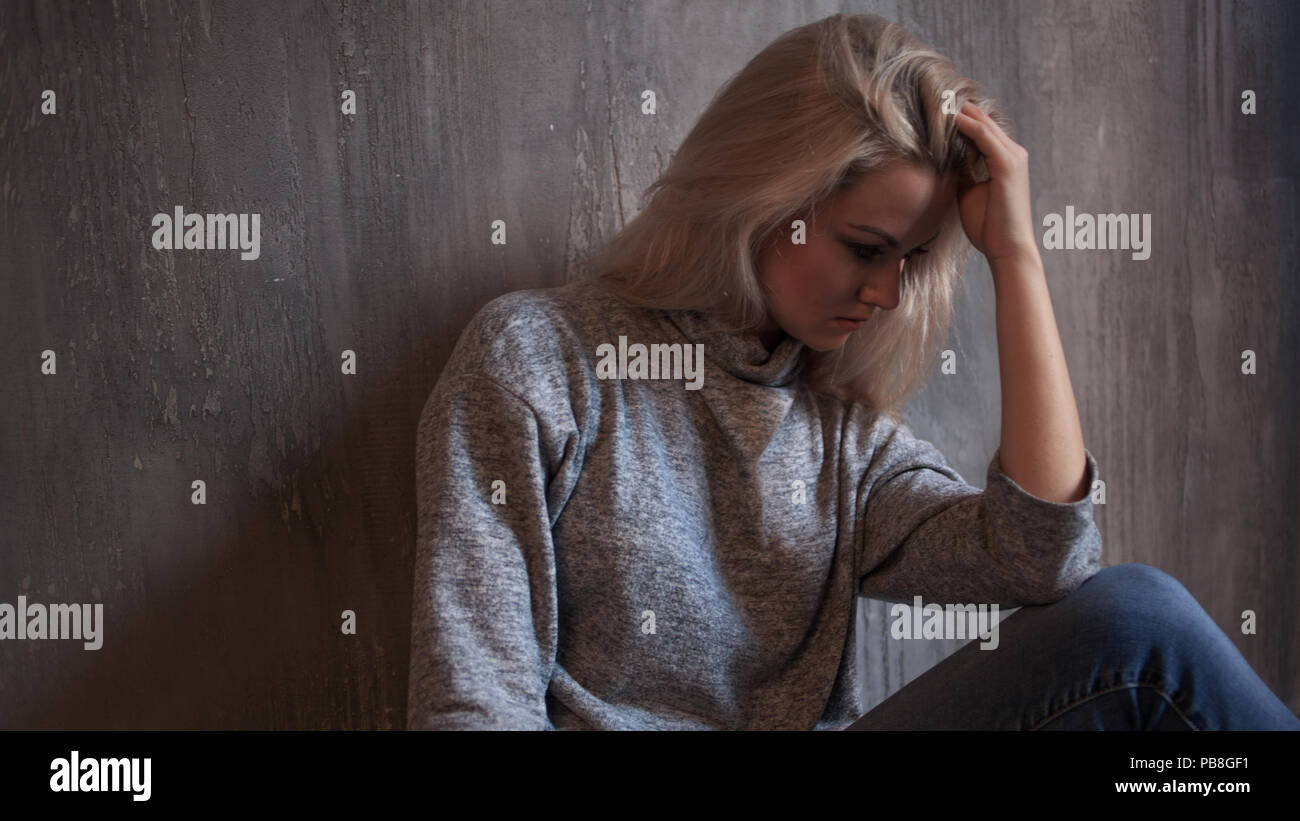 chronic fatigue syndrome. Young woman tired. Depressed girl sitting on ...