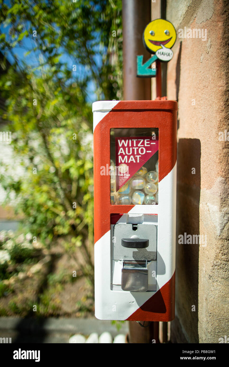 Nuremberg, Germany. 26th July, 2018. A joke machine hangs on the house ...