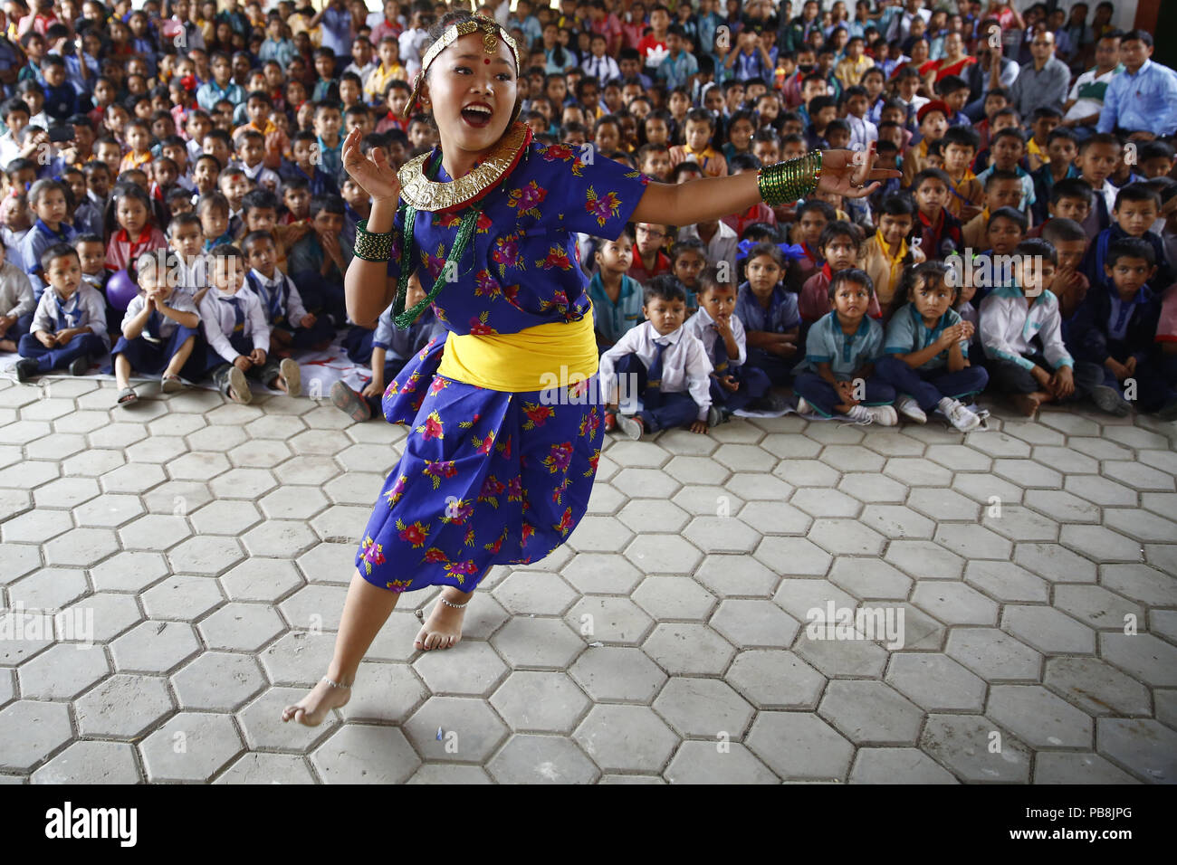 Kathmandu, Nepal. 27th July, 2018. A Nepalese school girl dressed in a ...