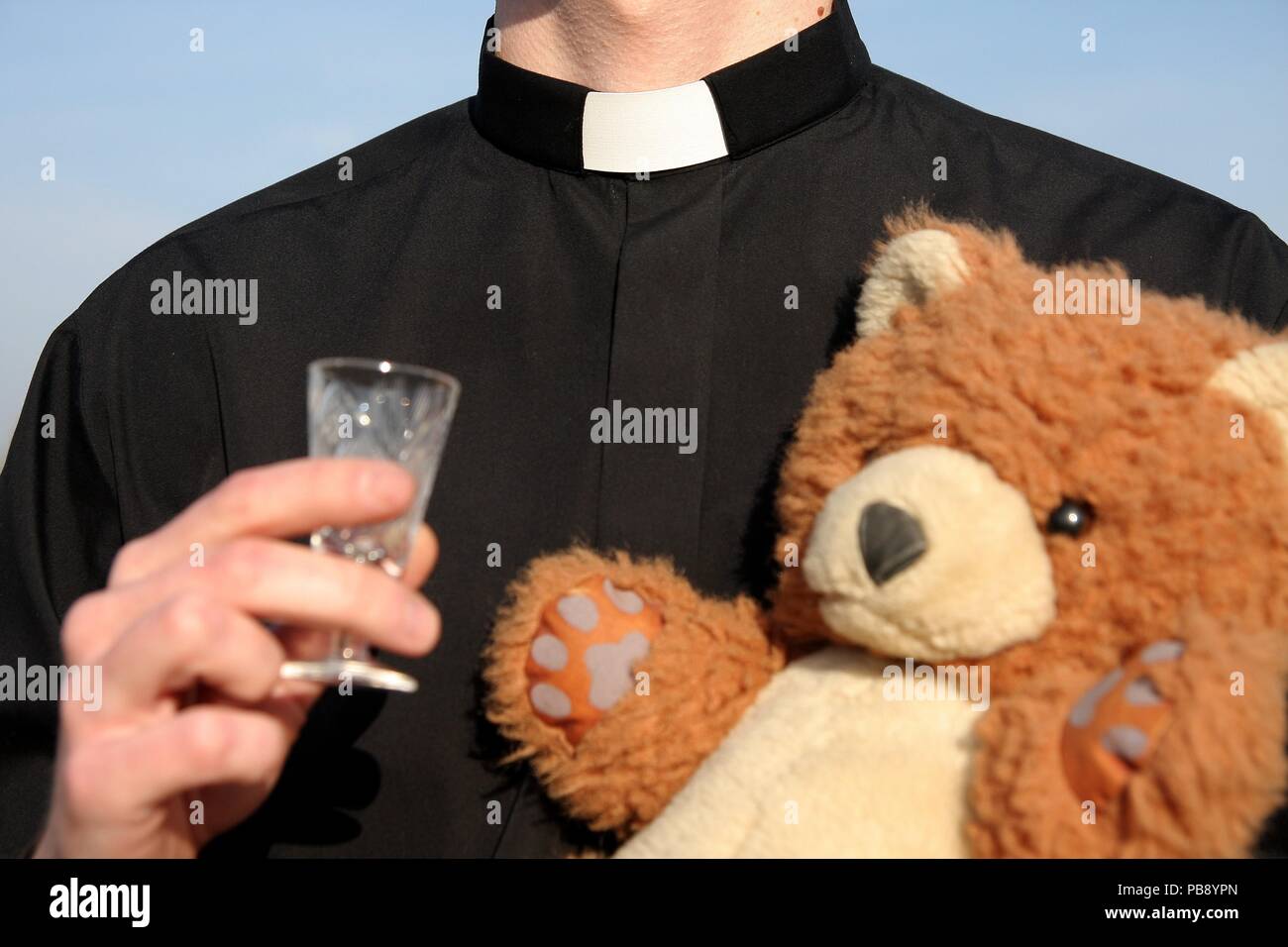 Krosno, Poland. 26th July, 2018. Priest with a plush mascot and a glass ...