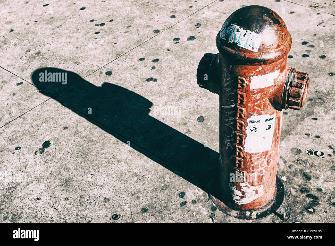 Red street hydrant for water access in the street Stock Photo - Alamy