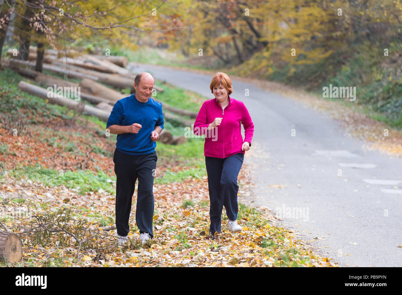 Senior family couple jogging hi-res stock photography and images - Alamy