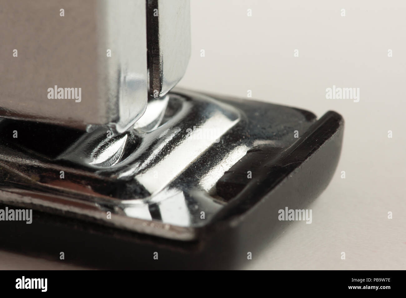 new stapler for stapling papers on a table Stock Photo - Alamy