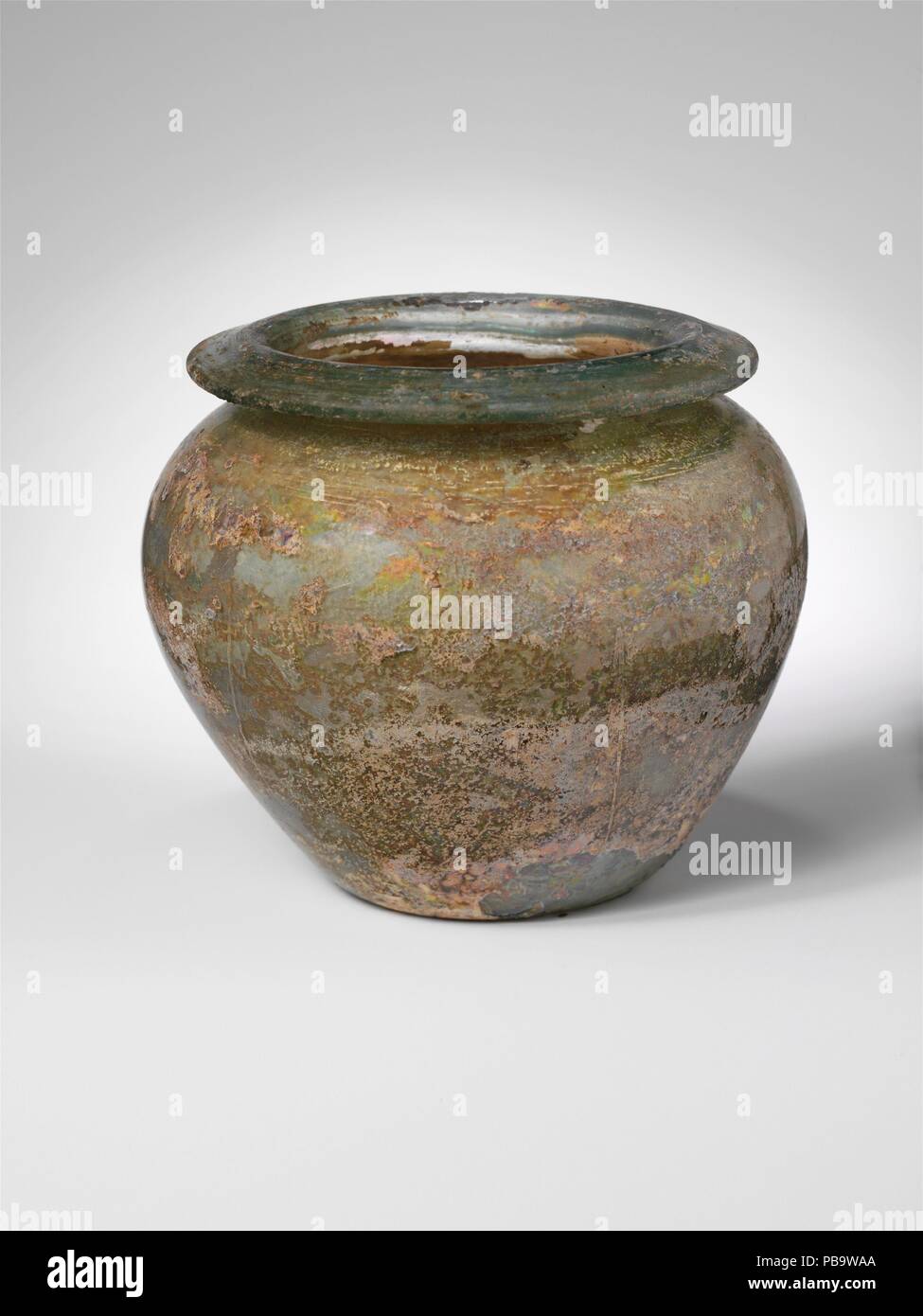 Glass jar. Culture: Roman. Dimensions: H.: 5 3/16 in. (13.2 cm). Date ...