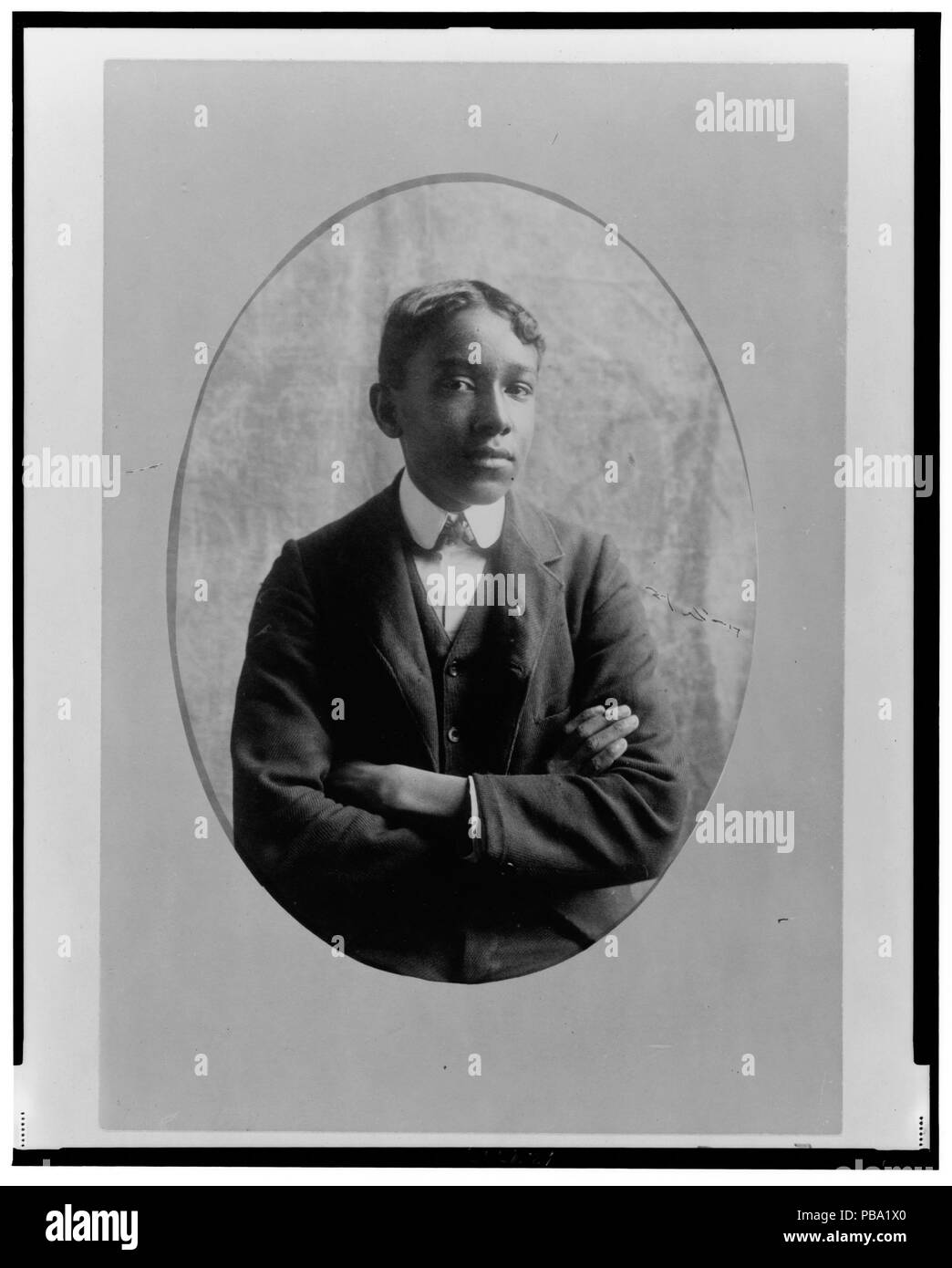1878 Young African American man, half-length portrait, with arms ...