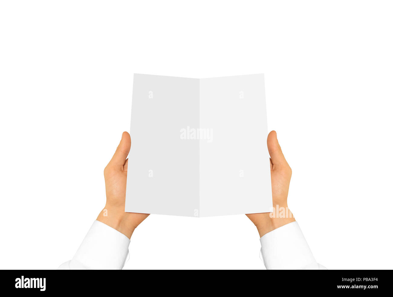 Hand in white shirt sleeve holding blank leaflet in the hand. Offset ...