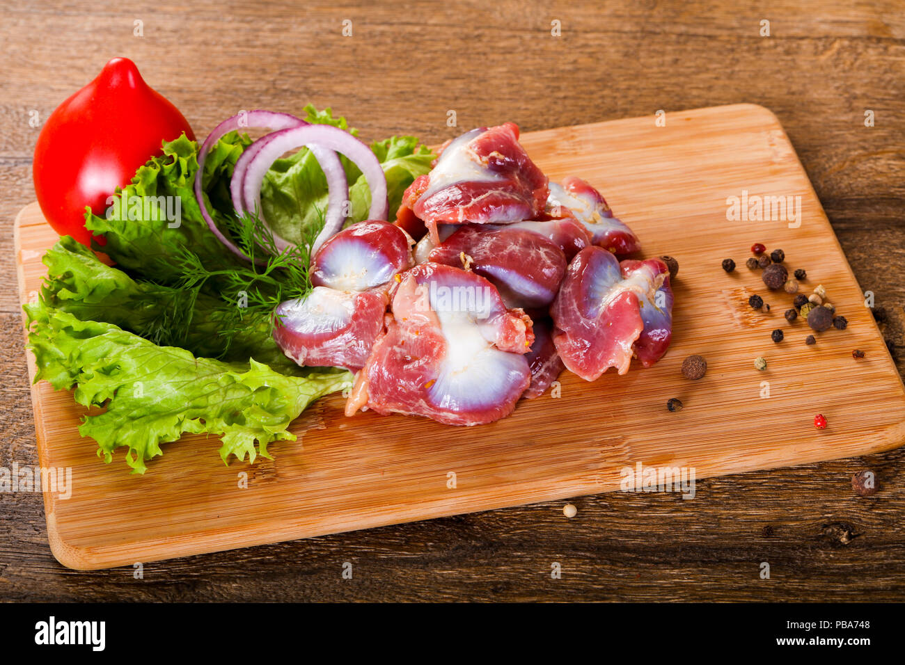 Raw chicken stomach for cooking Stock Photo - Alamy