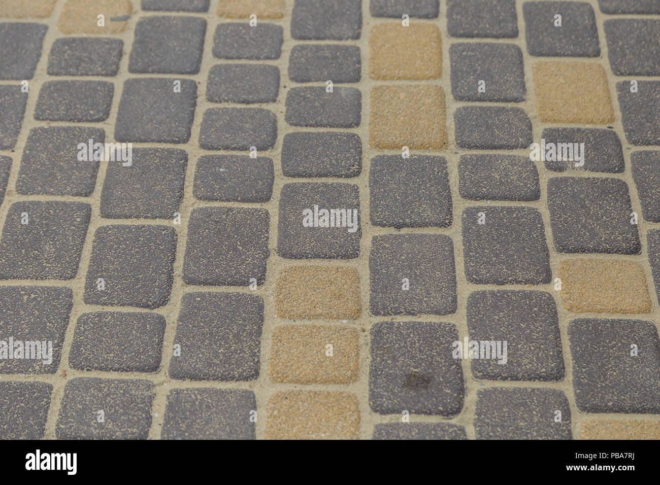 Sidewalk tiles with a new design, an exclusive product Stock Photo - Alamy