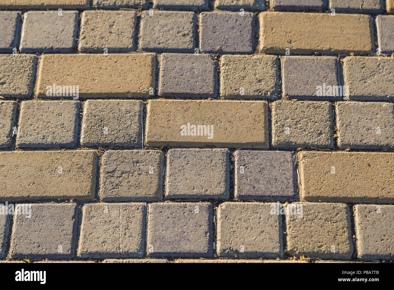 Sidewalk tiles with a new design, an exclusive product Stock Photo - Alamy