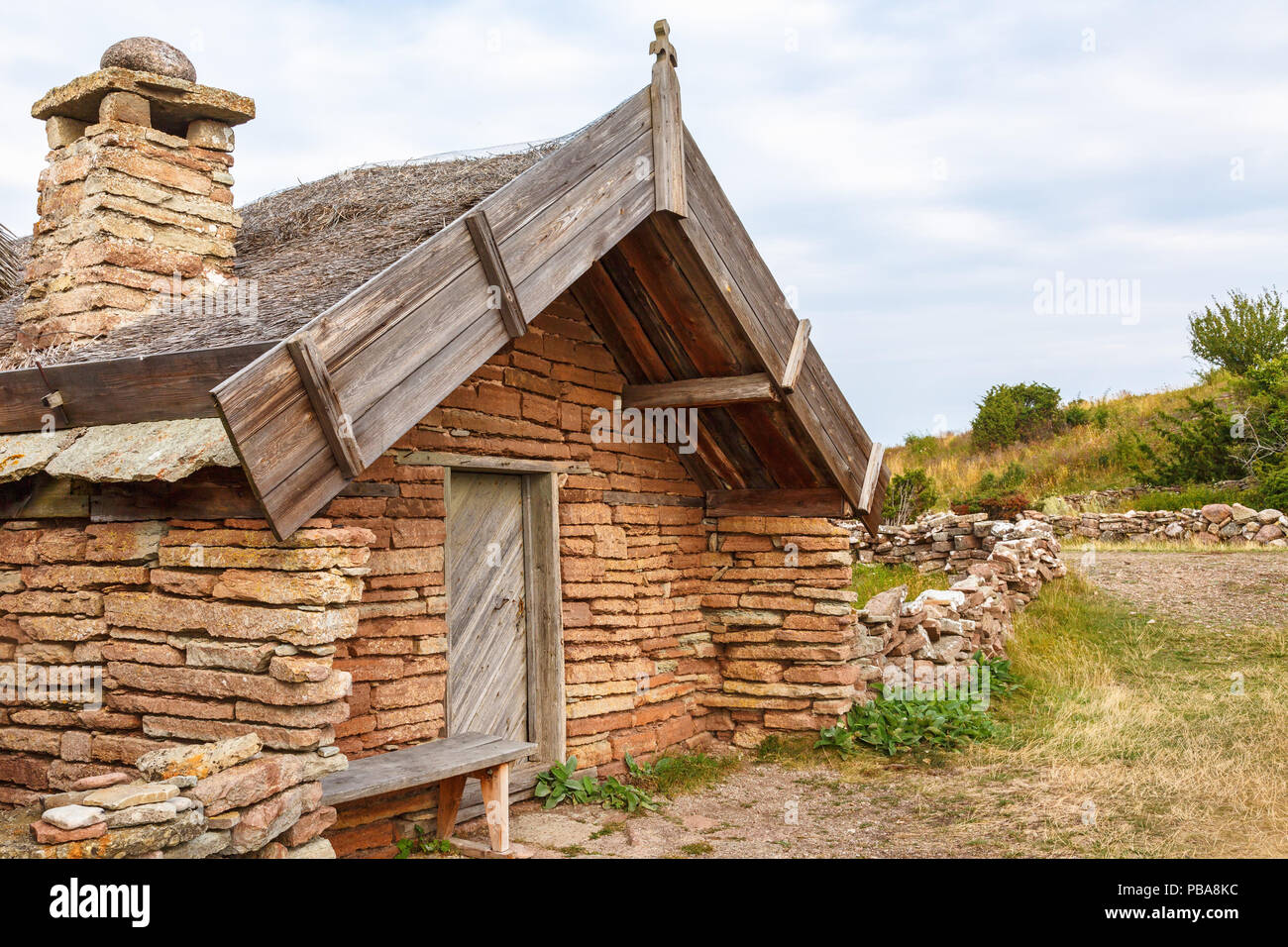 Old cottage built of limestone with thatched roof Stock Photo - Alamy