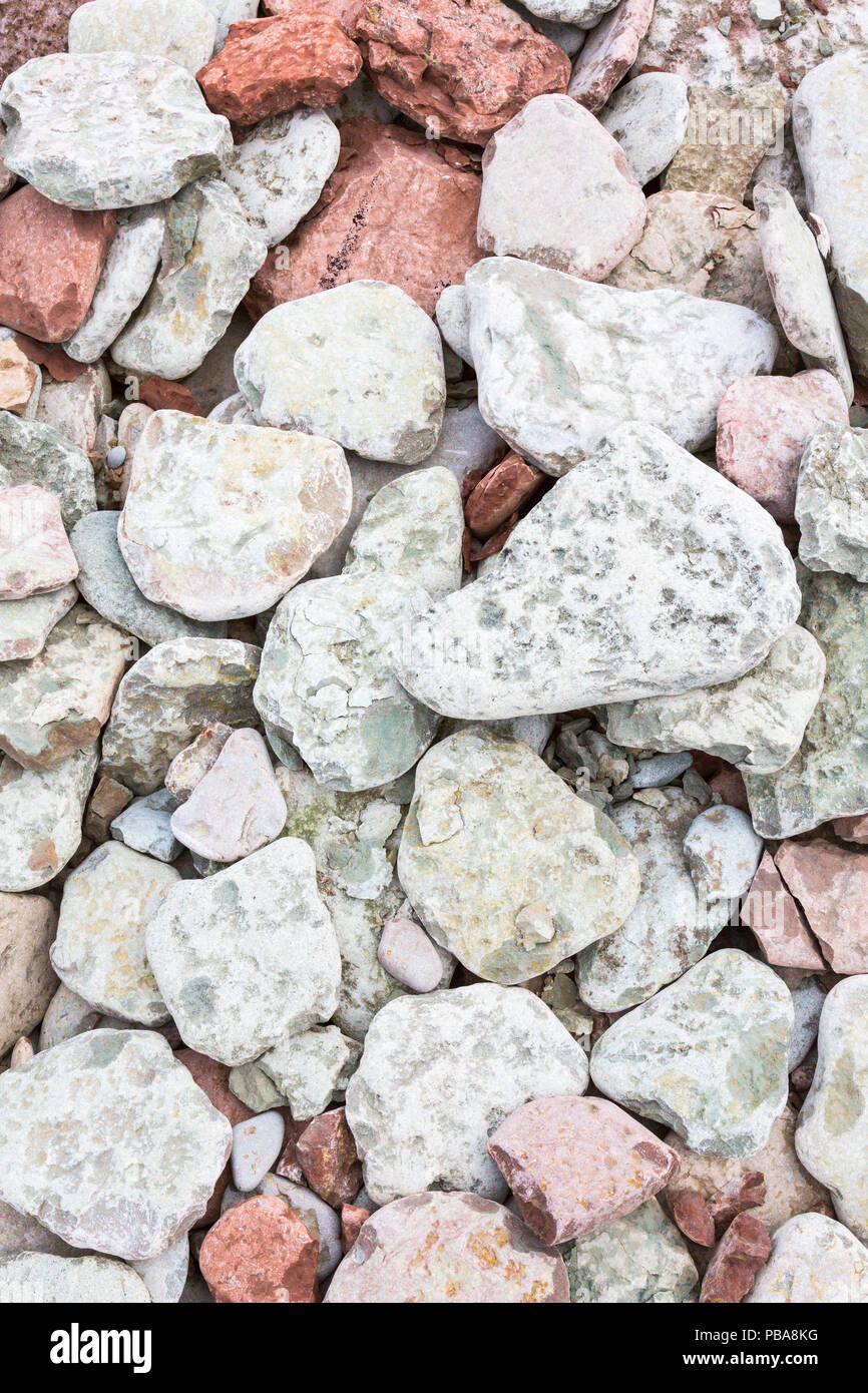 Stones lying on the ground Stock Photo - Alamy