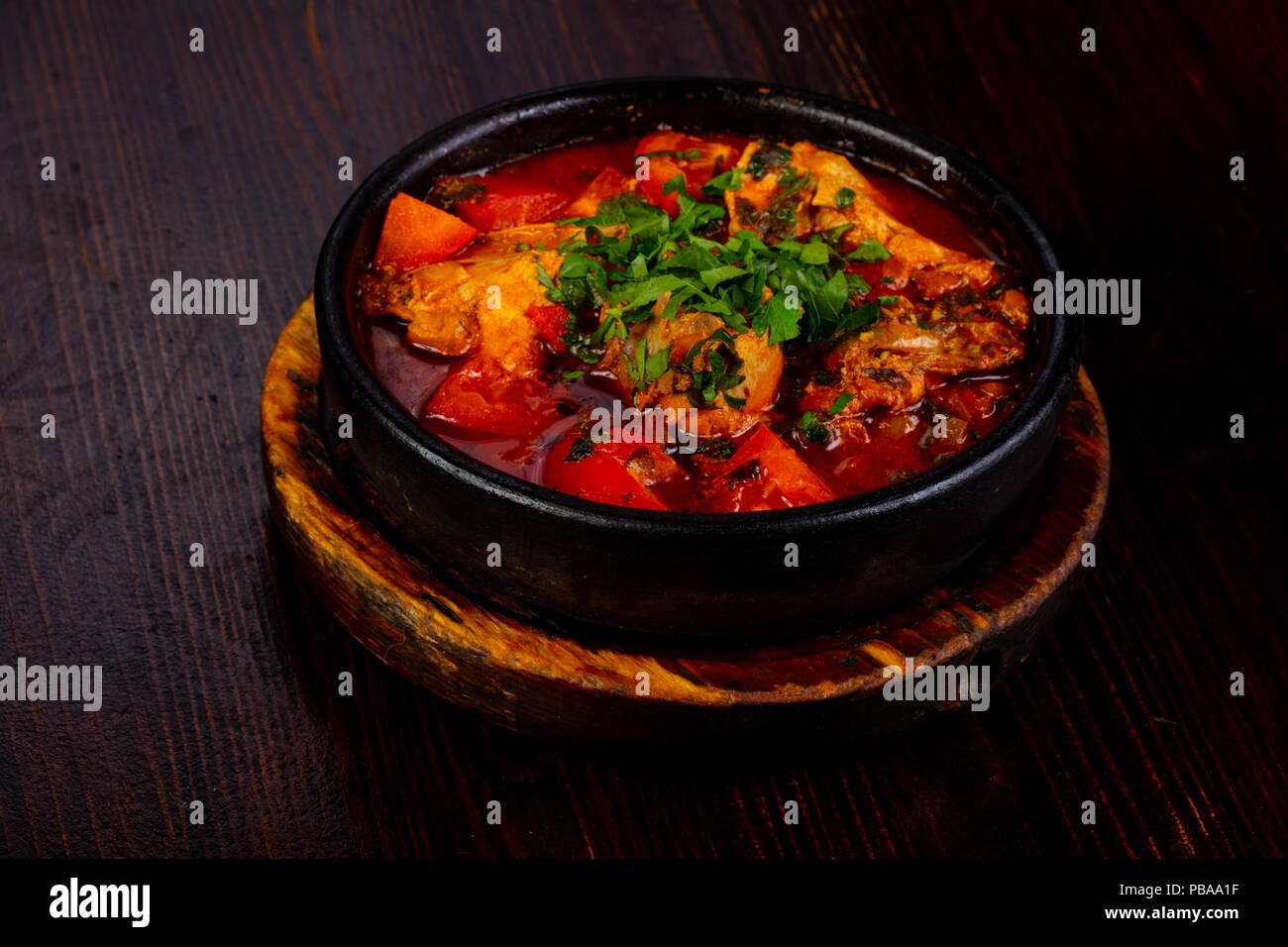 Georgian cuisine Chahohbili with chicken Stock Photo - Alamy