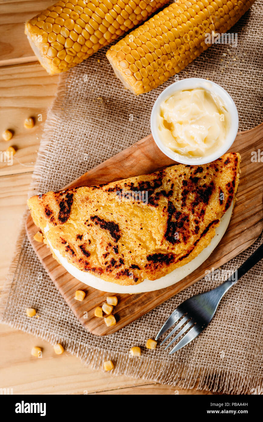 Cachapa with cheese, typical Venezuelan dish made with corn, cheese and ...