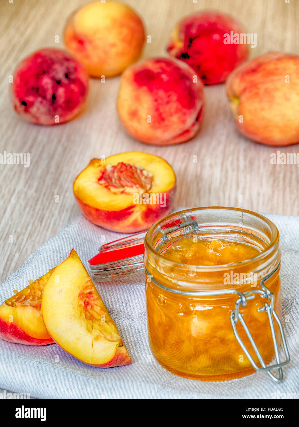 Jar of homemade peach jam Stock Photo - Alamy