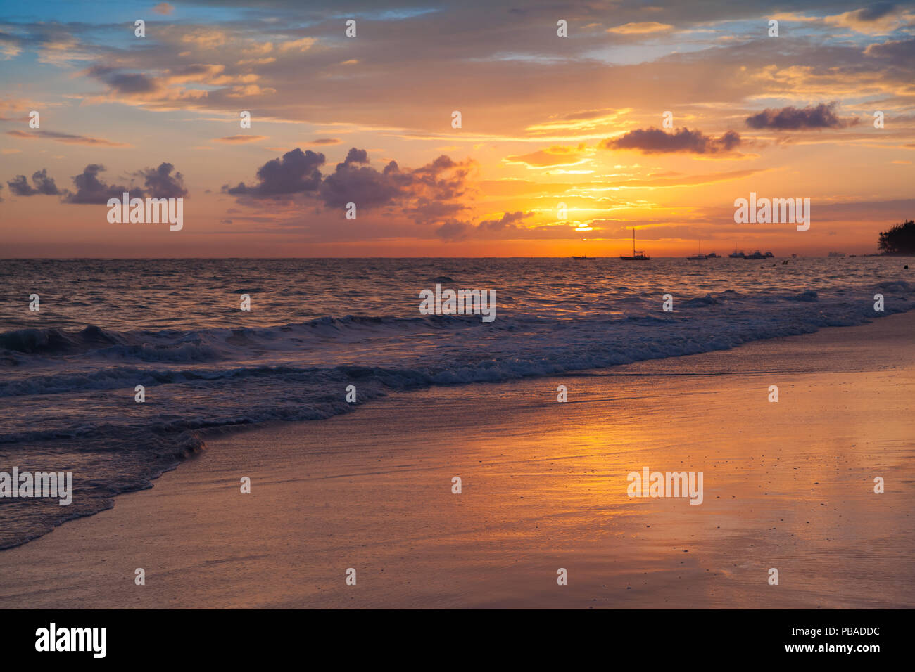 Colorful sunrise over Atlantic Ocean. Bavaro beach, Hispaniola Island ...