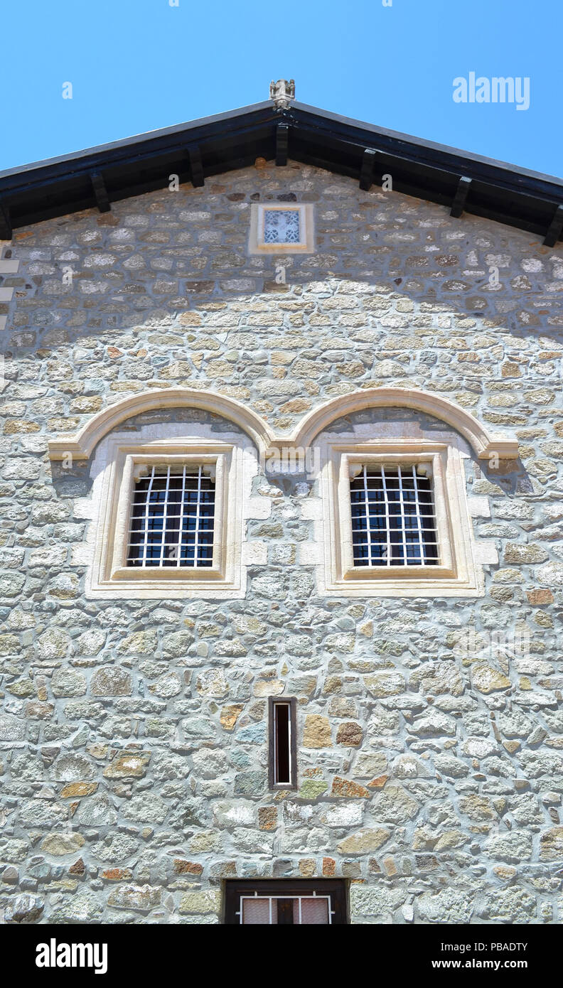 Window on a stone wall of the house. Due to the windows location ...