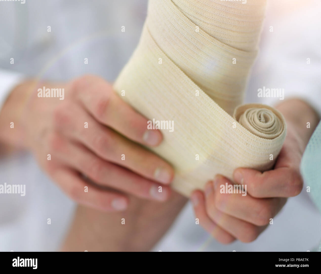 closeup.doctor applying elastic bandage Stock Photo - Alamy