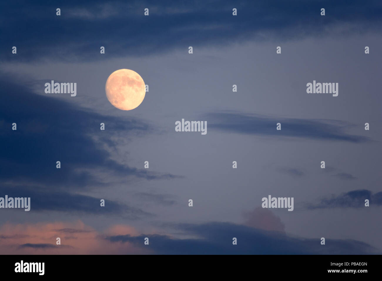 Dark sunset time full moon hi-res stock photography and images - Alamy
