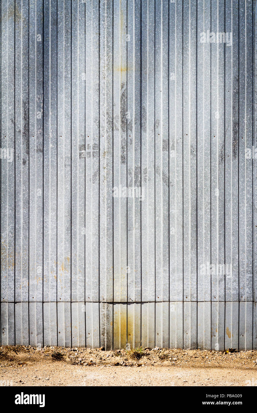 Old rusty metal warehouse wall. Architecture detail background. Metal ...