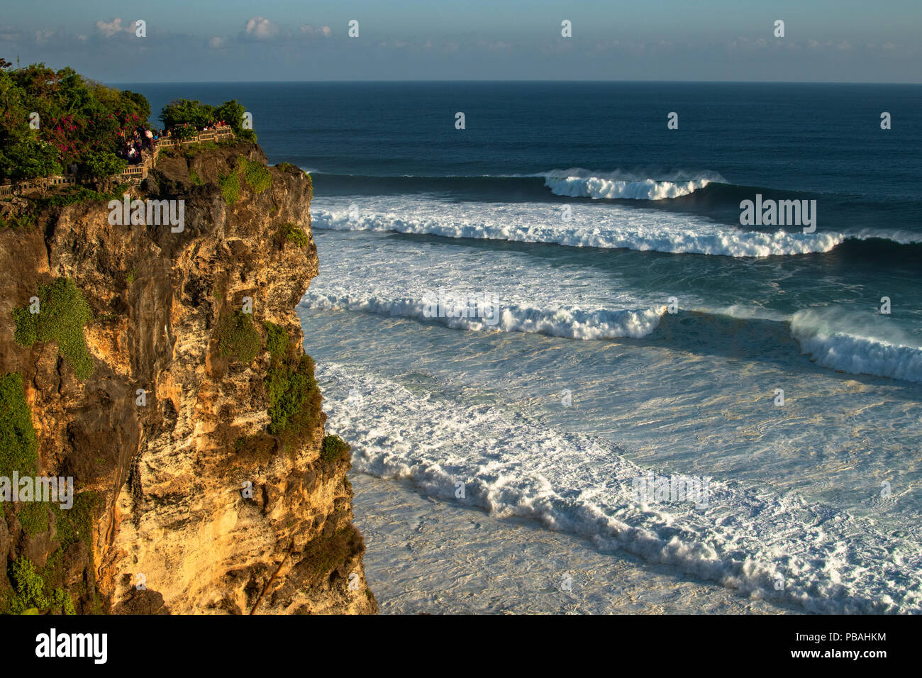 Rock Uluwatu temple and waves, Bali, Indonesia Stock Photo - Alamy